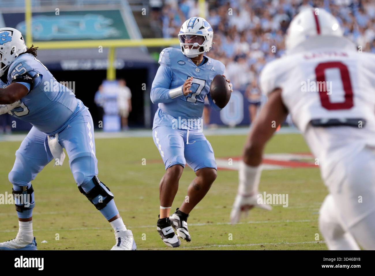 North Carolina quarterback Gio Lopez (7) looks to pass during the first ...