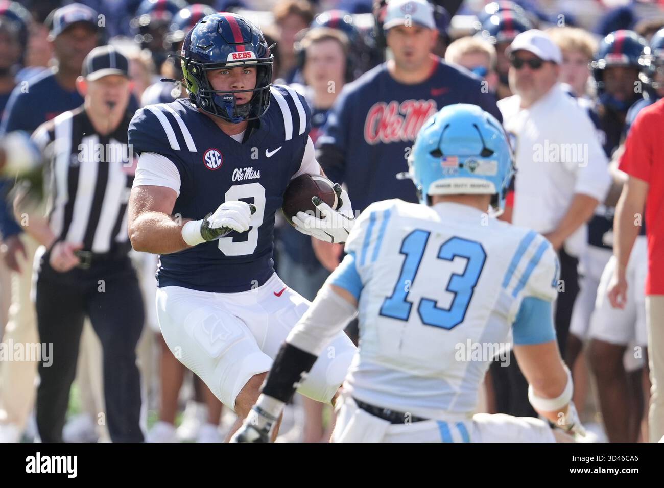 Mississippi tight end Luke Hasz (9) attempts to run past Citadel ...