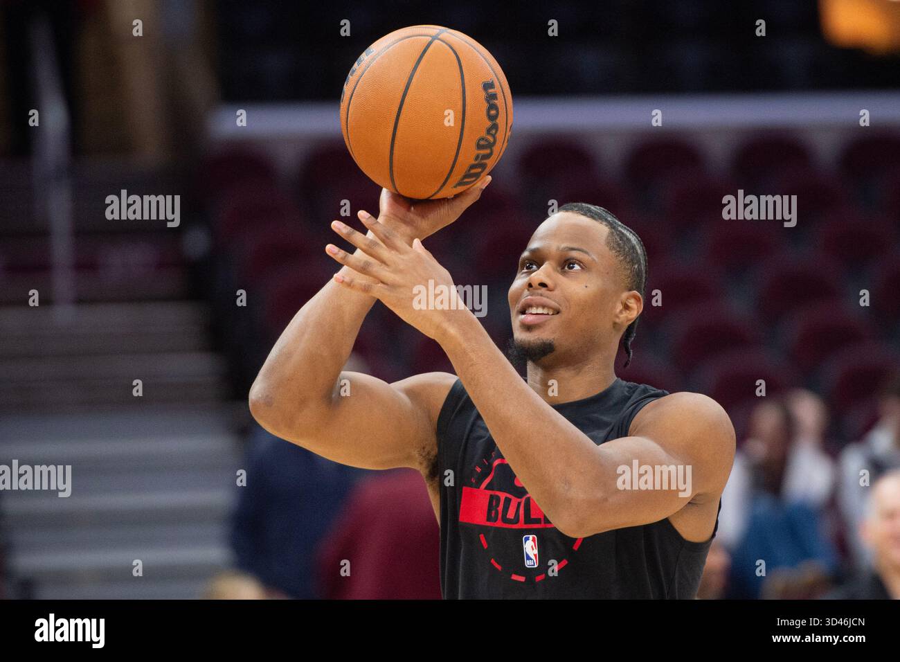 Chicago Bulls' Isaac Okoro warms up before the start of an NBA ...