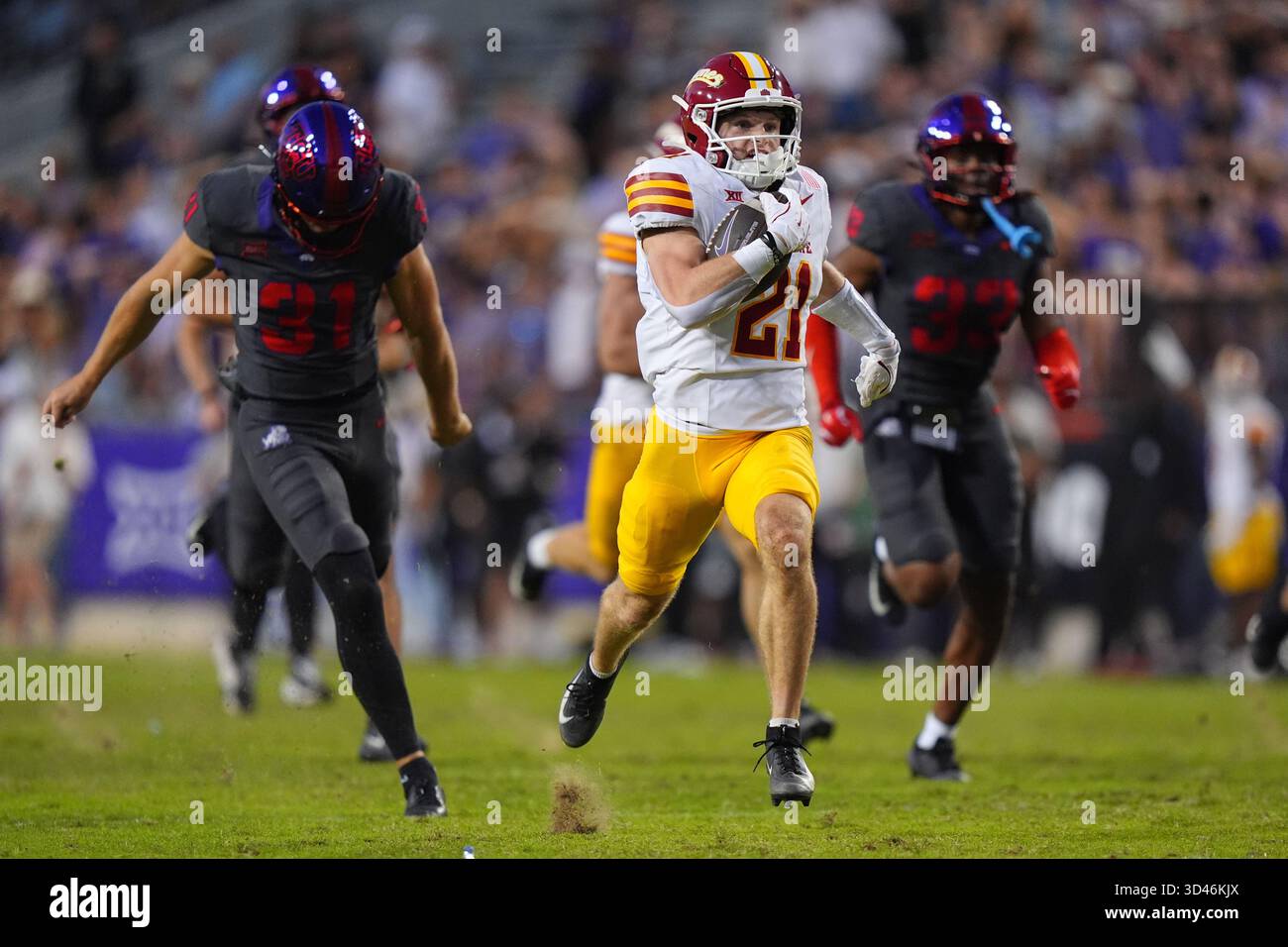 Iowa State running back Aiden Flora (21) breaks away to score a ...