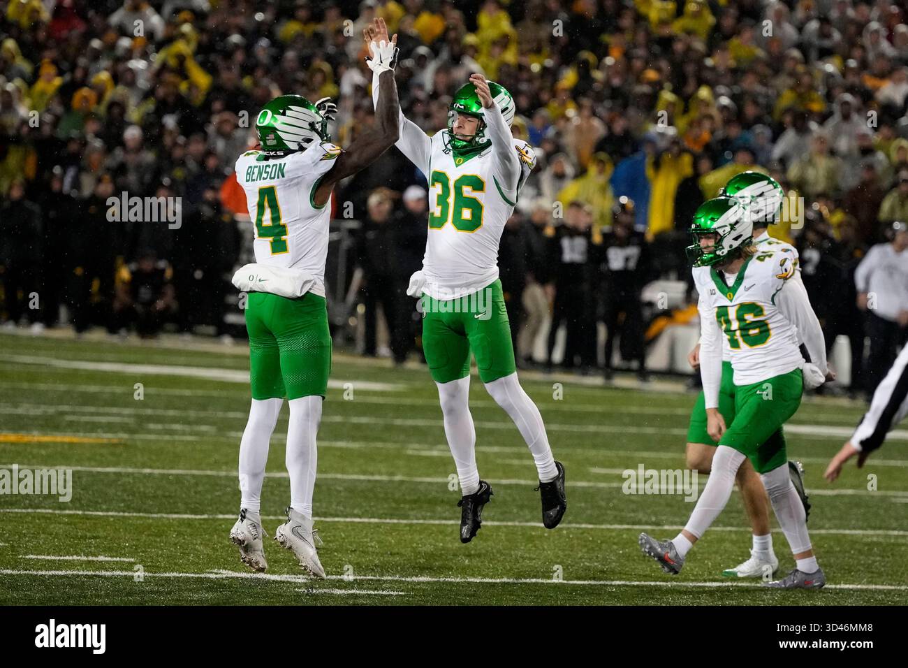 Oregon kicker Atticus Sappington (36) celebrates with teammate Malik ...
