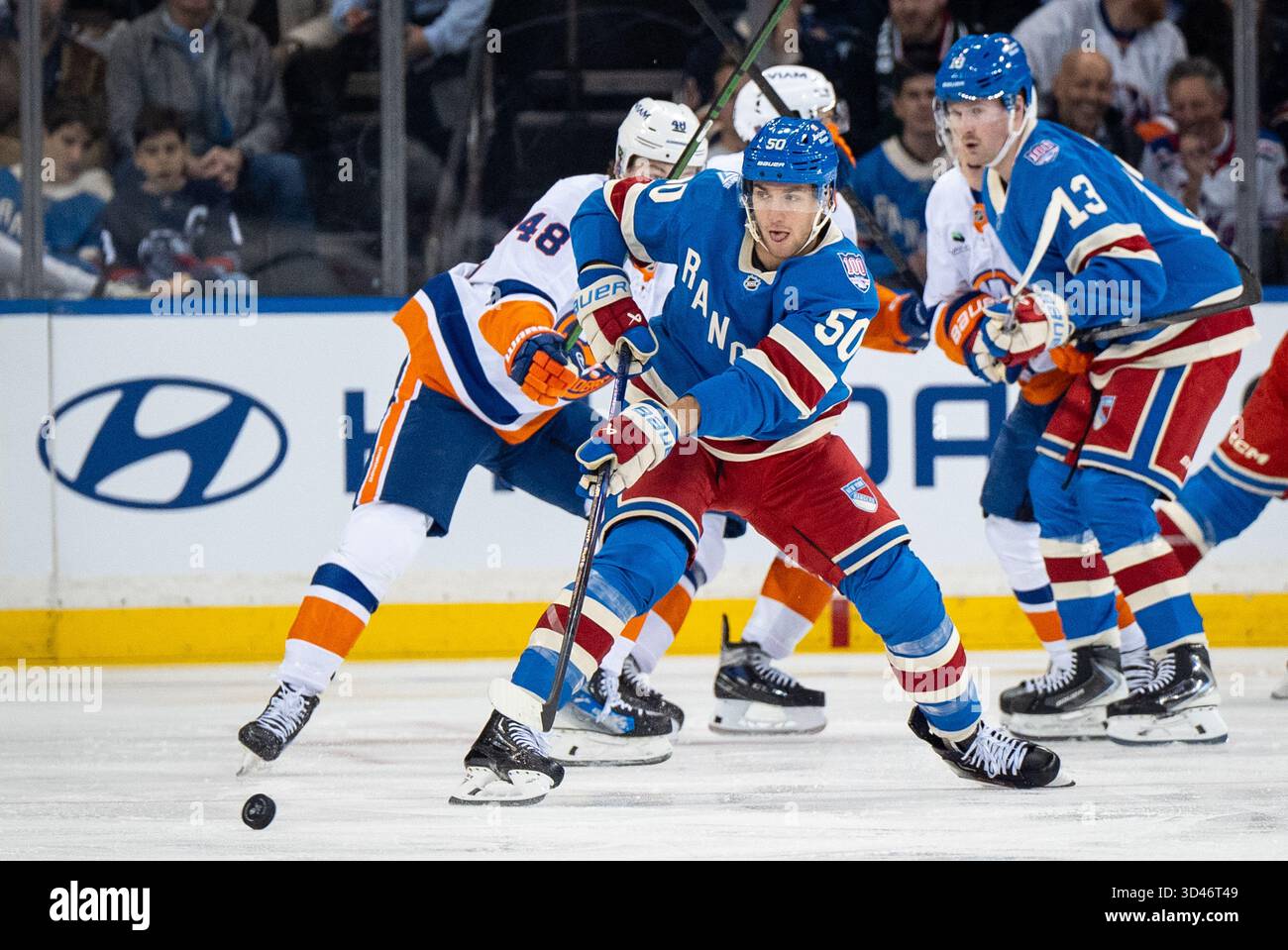 New York Rangers left wing Will Cuylle (50) passes the puck during the ...
