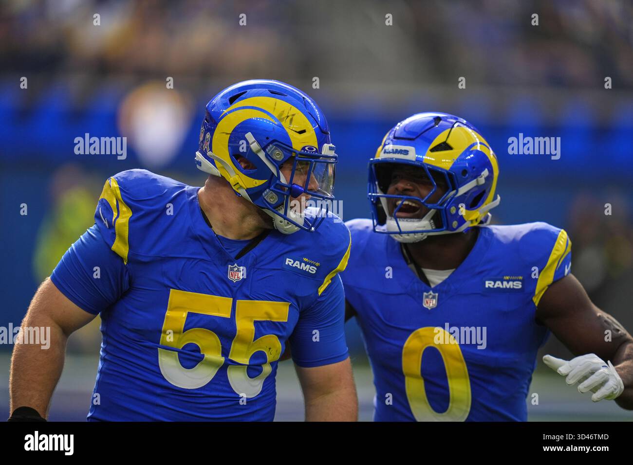 Los Angeles Rams defensive end Braden Fiske (55) and offensive lineman ...
