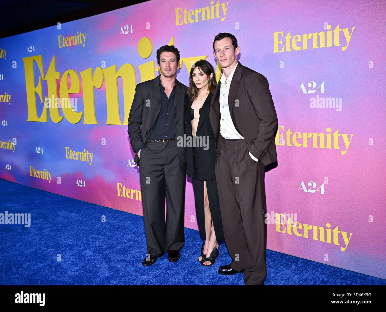 Miles Teller, left, Elizabeth Olsen and Callum Turner attend the ...