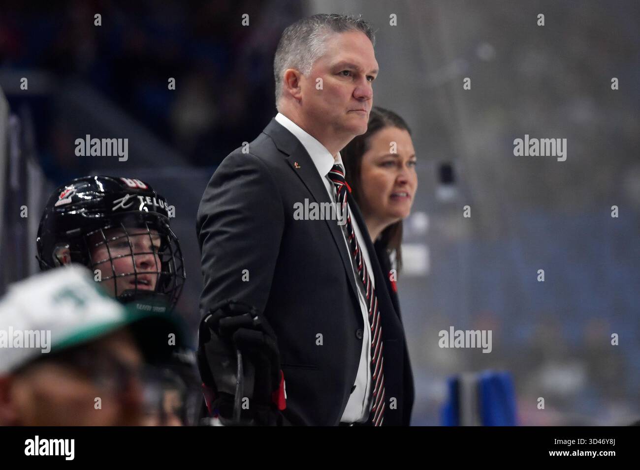 Canada head coach Troy Ryan watches play during the second period of a ...