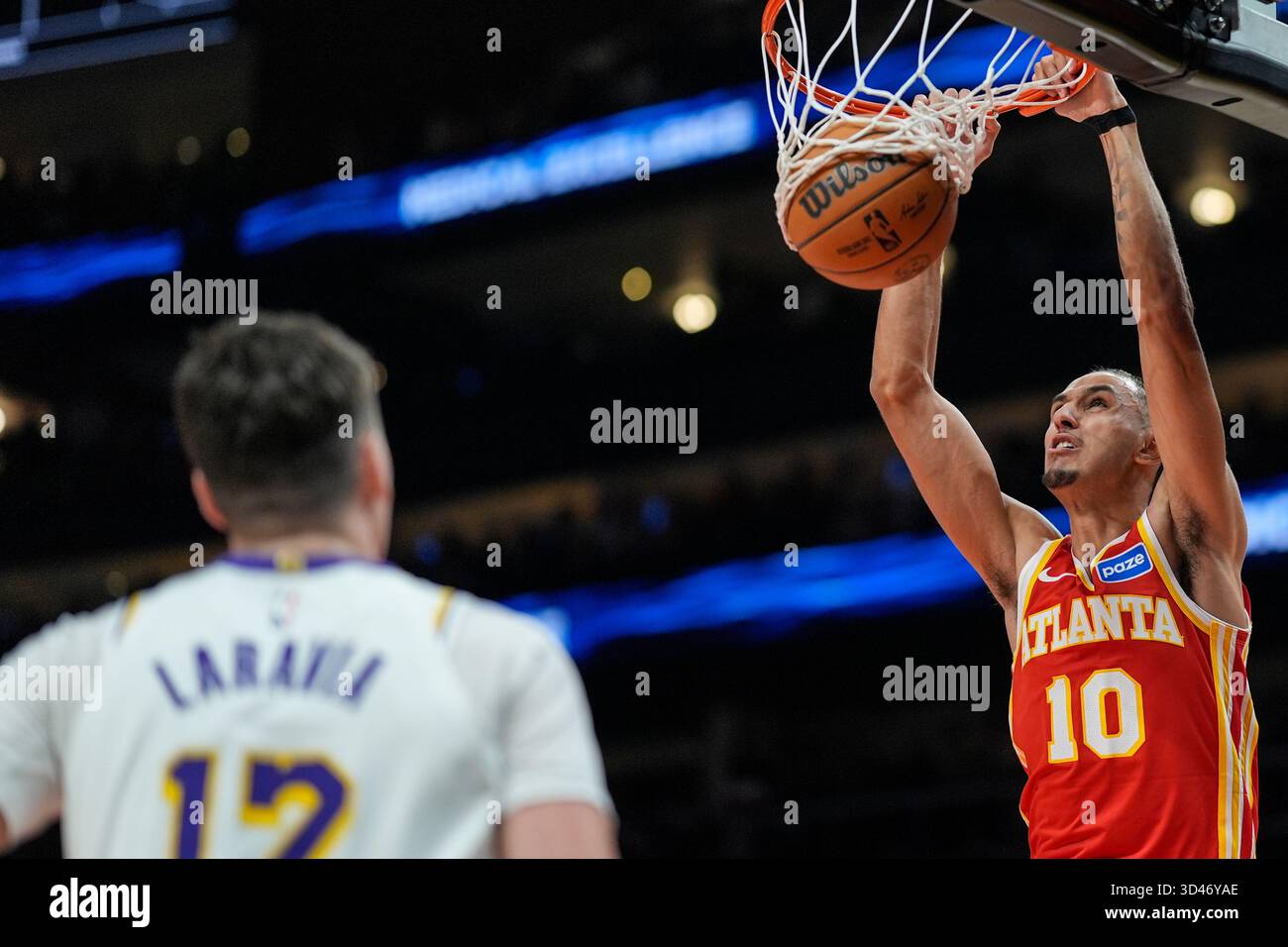 Atlanta Hawks forward Zaccharie Risacher (10) dunks against Los Angeles ...