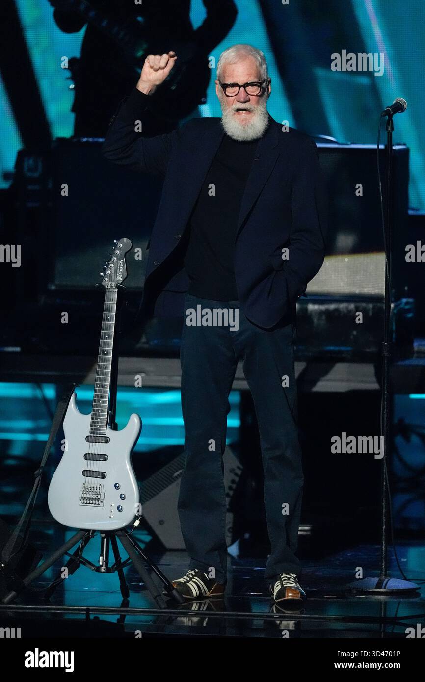 David Letterman, alongside the guitar that Warren Zevon gave to him ...