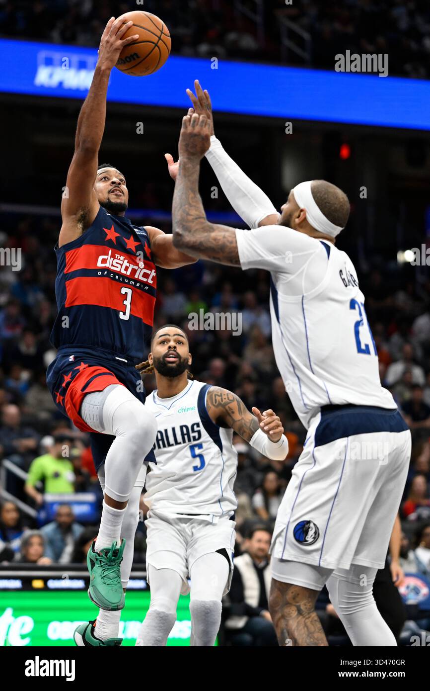 Washington Wizards guard CJ McCollum (3) rises over Dallas Mavericks ...