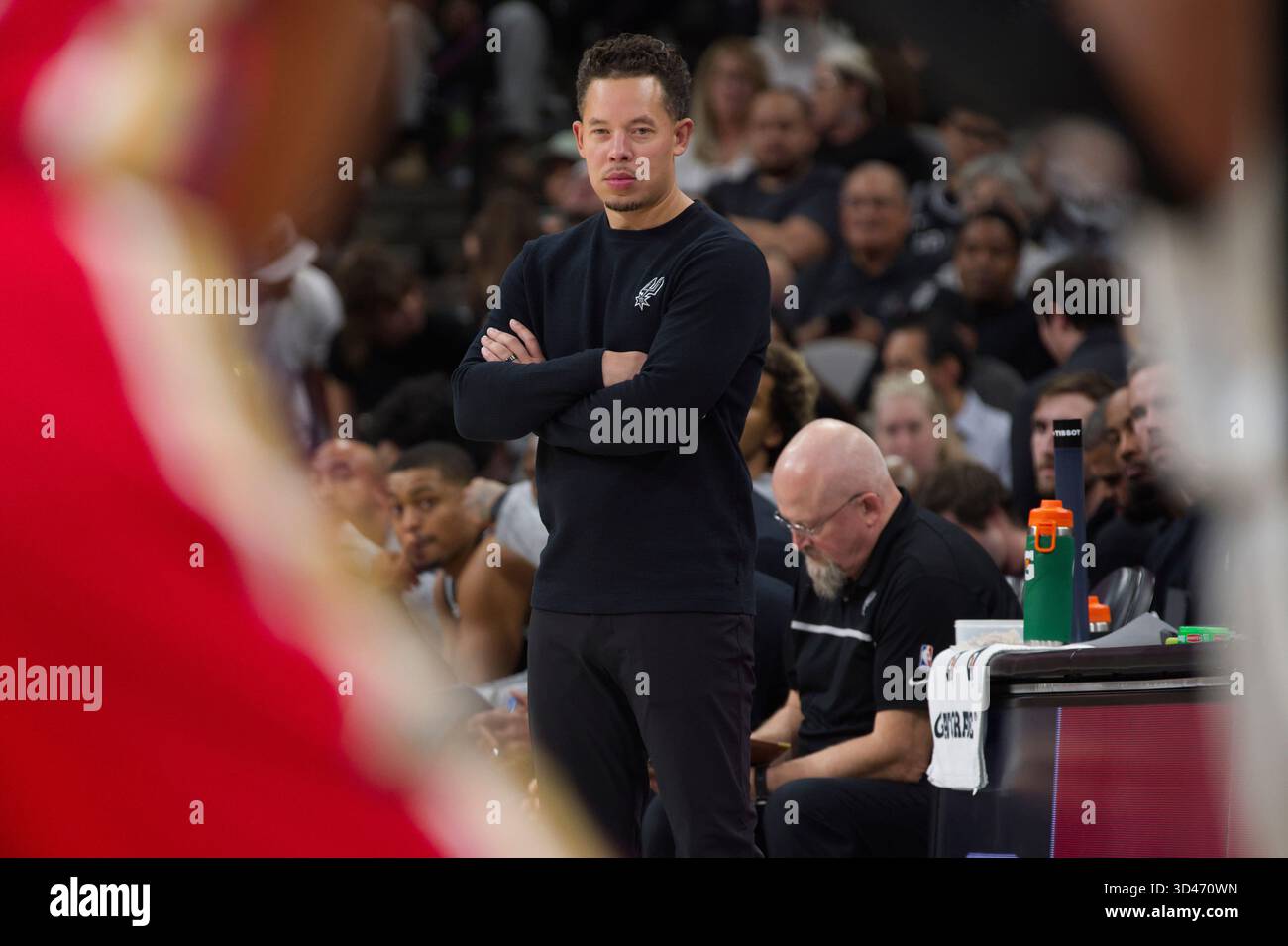 San Antonio Spurs head coach Mitch Johnson watches play during the ...