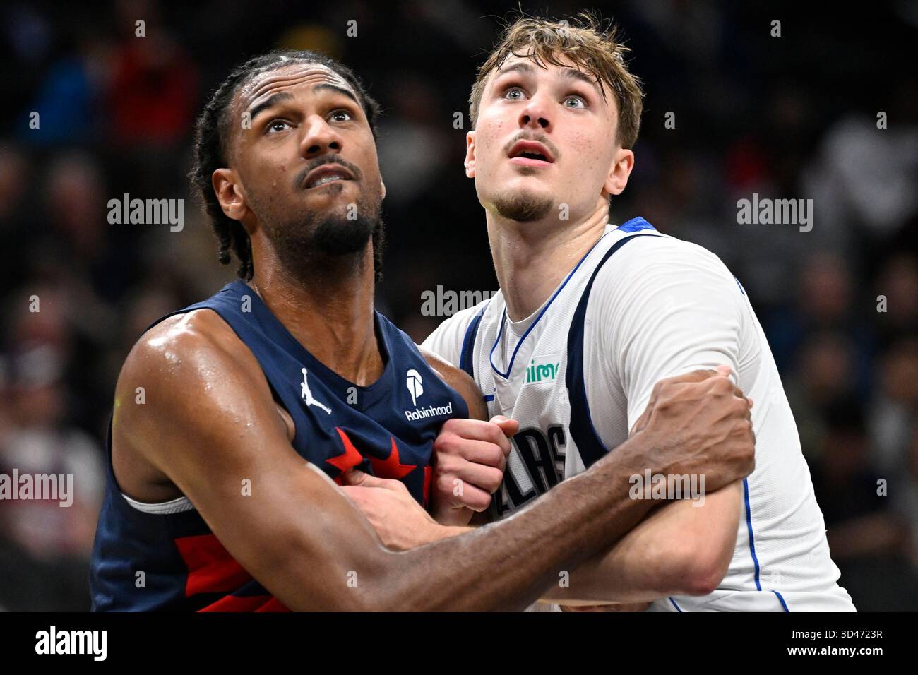 Washington Wizards center Alex Sarr, left, and Dallas Mavericks forward ...