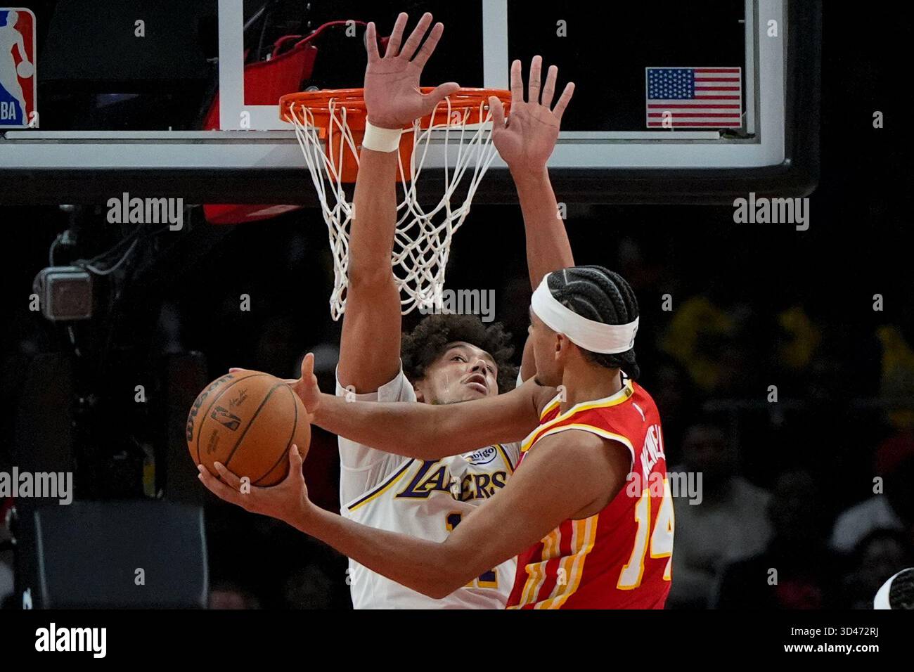 Atlanta Hawks forward Asa Newell (14) shoots against Los Angeles Lakers ...
