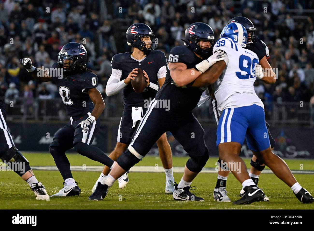 UConn quarterback Joe Fagnano (2) throws against Duke during the first ...