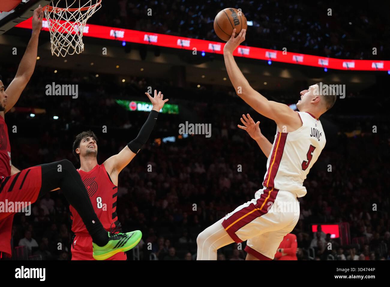 Miami Heat forward Nikola Jovic (5) shoots as Portland Trail Blazers ...