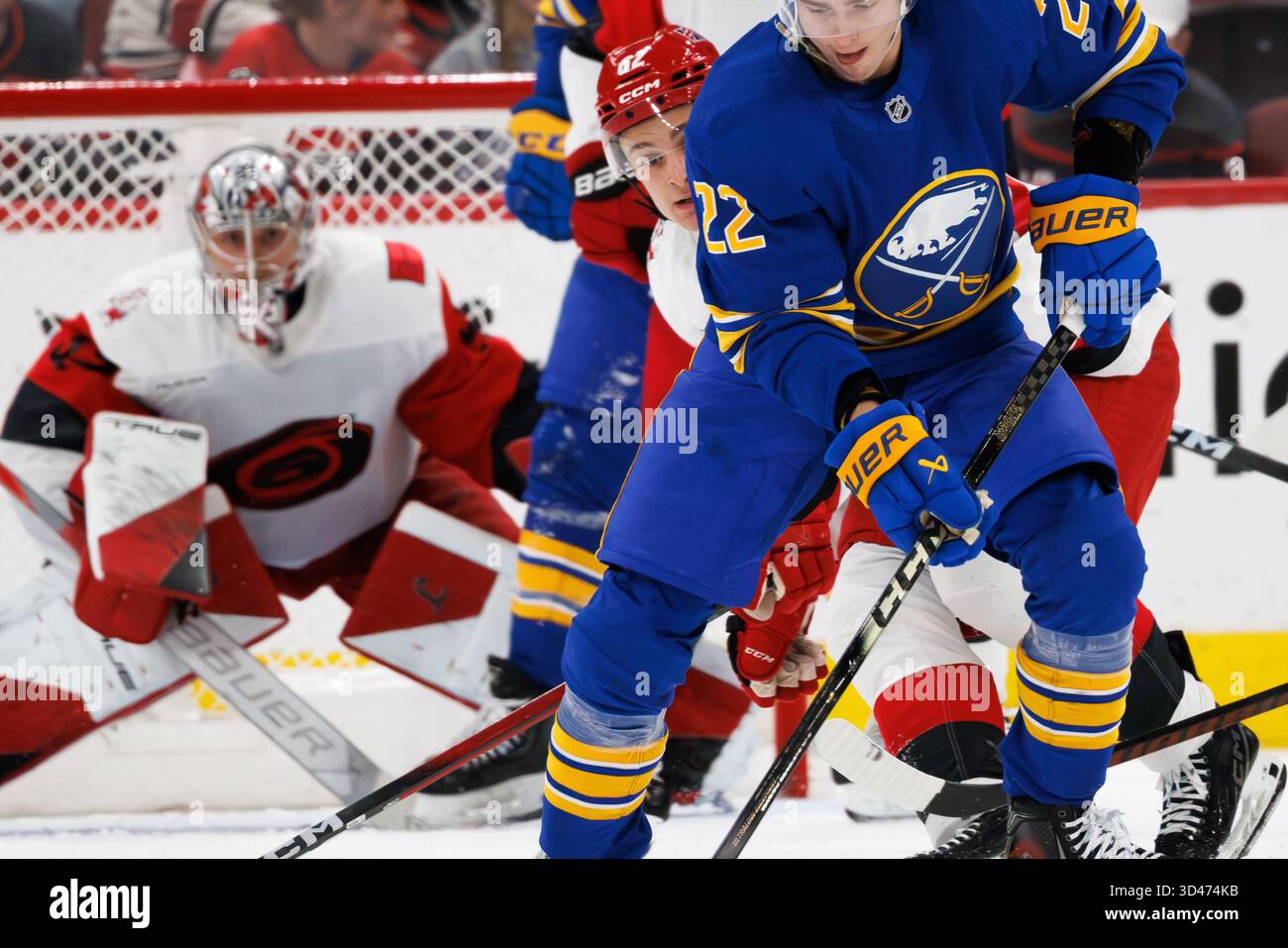 Buffalo Sabres Jack Quinn (22) handles the puck ahead of Carolina ...