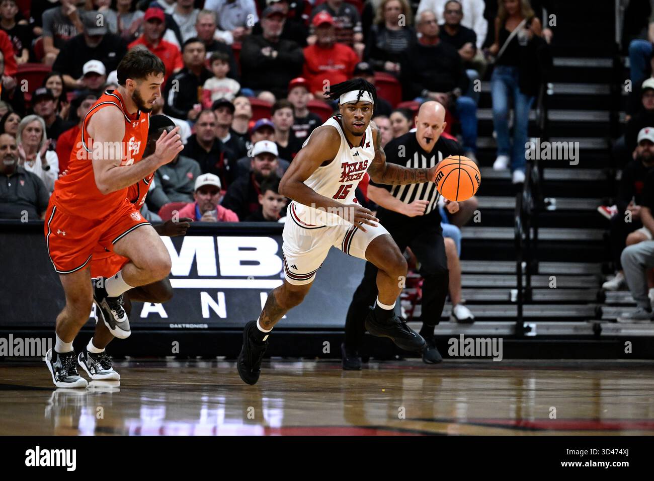 Texas Tech forward JT Toppin (15) brings the ball up court against Sam ...