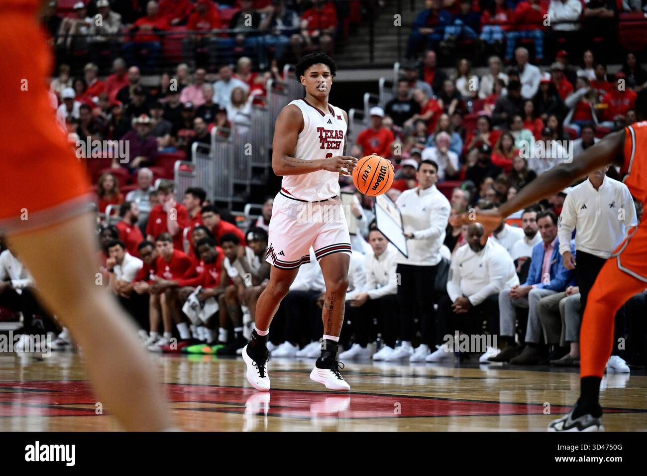 Texas Tech forward Lejuan Watts (3) brings the ball up court against ...