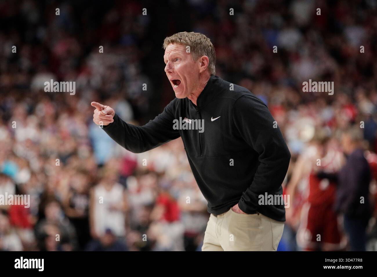 Gonzaga head coach Mark Few directs his team during the first half of ...