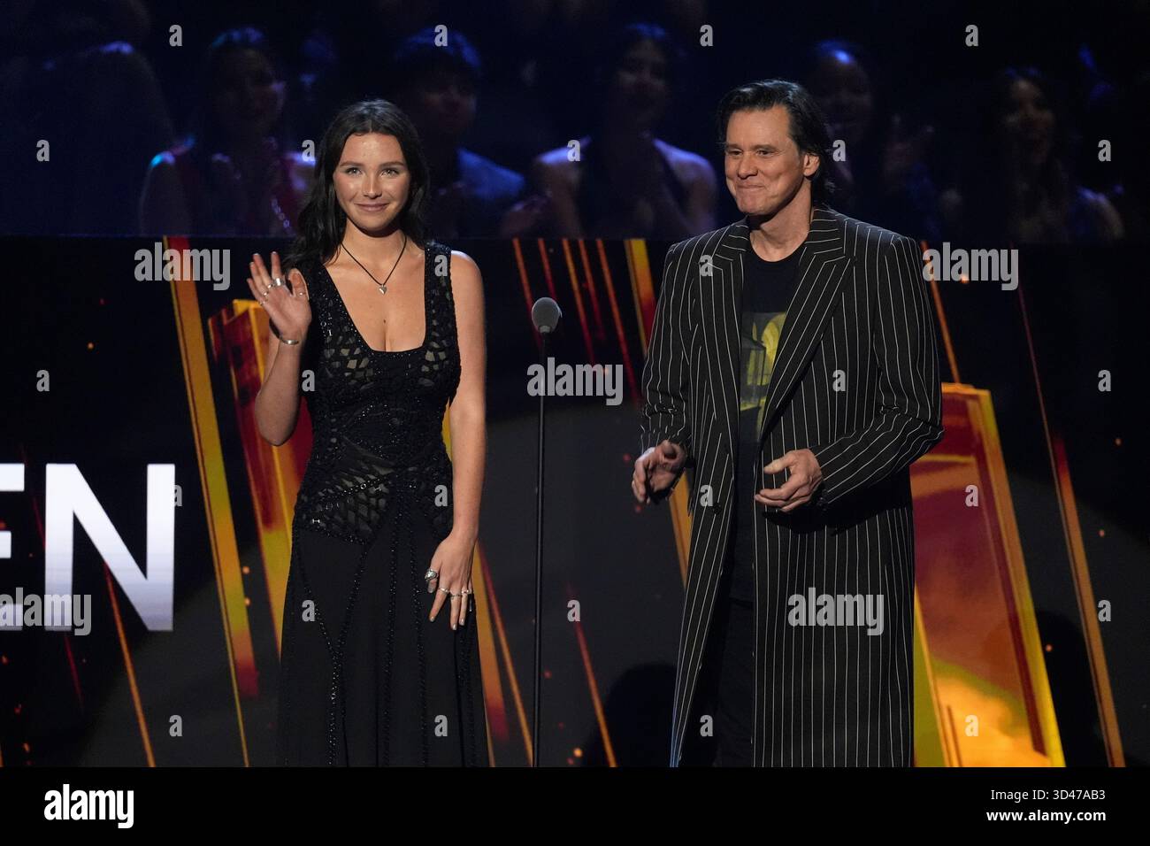 Lillian Cornell and Jim Carrey speak during the 2025 Rock and Roll Hall ...