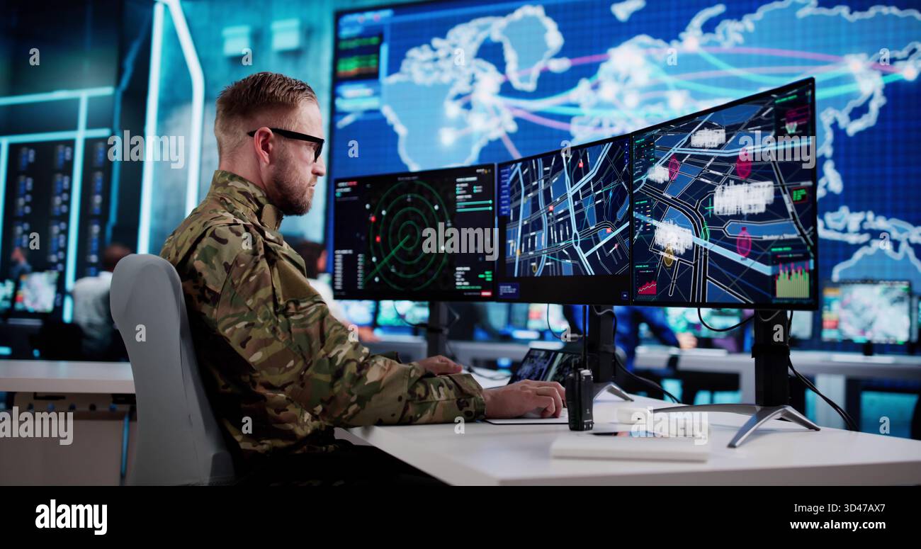 Government Army Control Center: Man Monitoring Soldiers At Computer ...