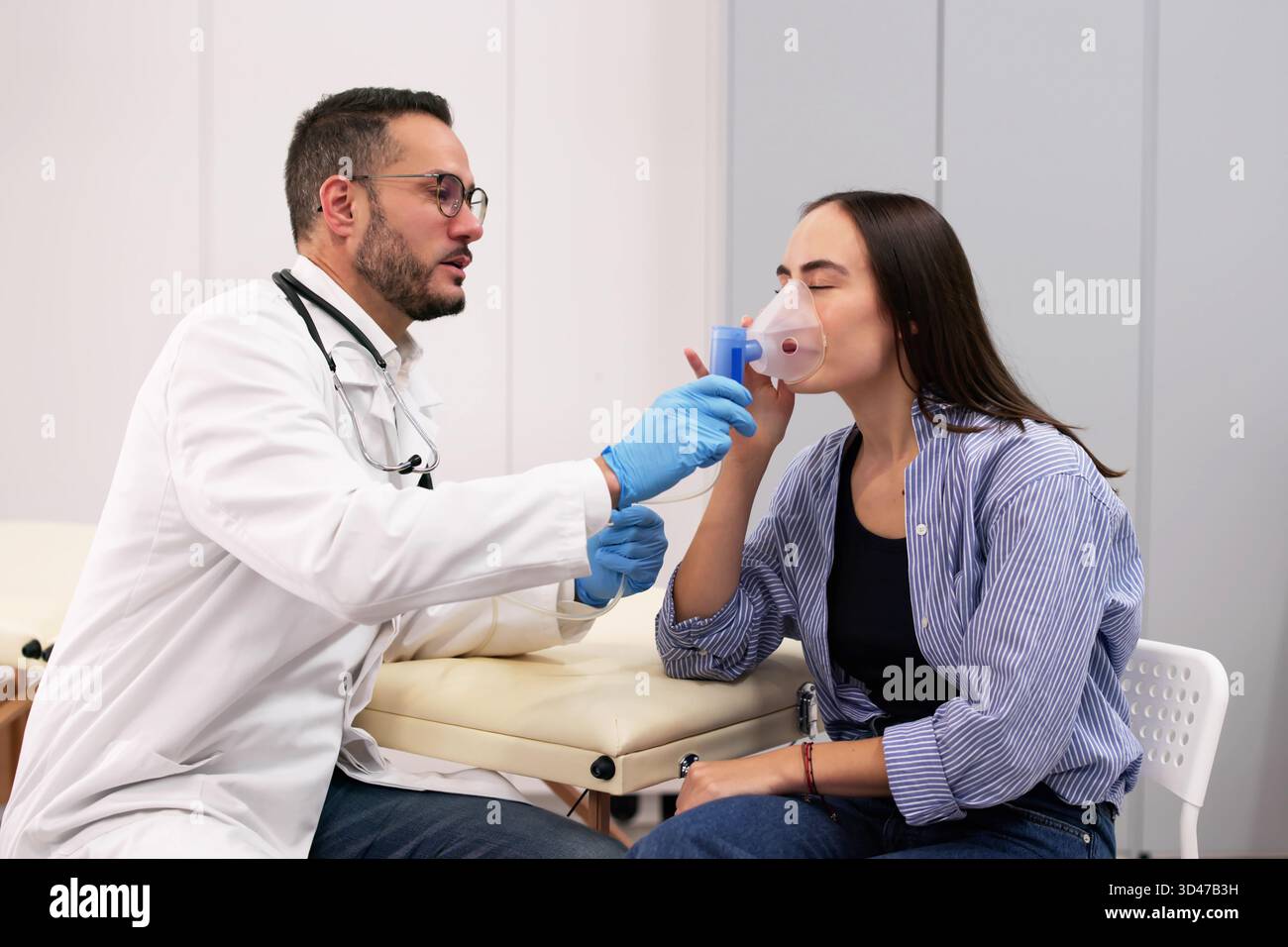 Female Respiratory Patient Is Treated With A Nebulizer At The Pulmonary ...
