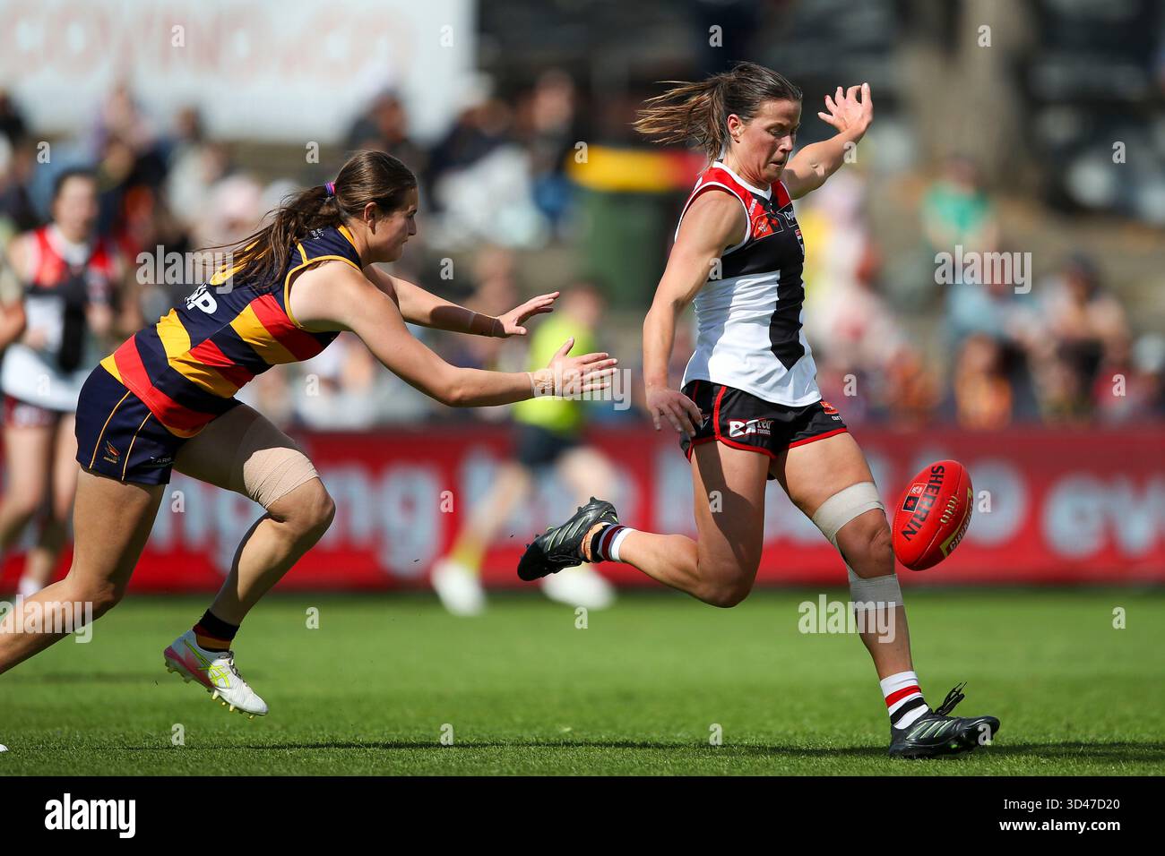 Nicola Barr of the Saints chased by India Rasheed of the Crows during ...