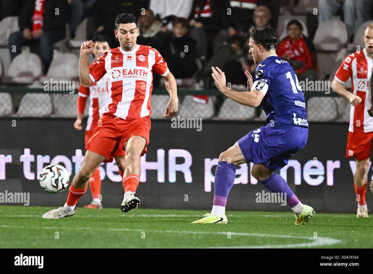 Kortrijk's Lennard Hens and Patro Eisden's Jordan Renson fight for the ...