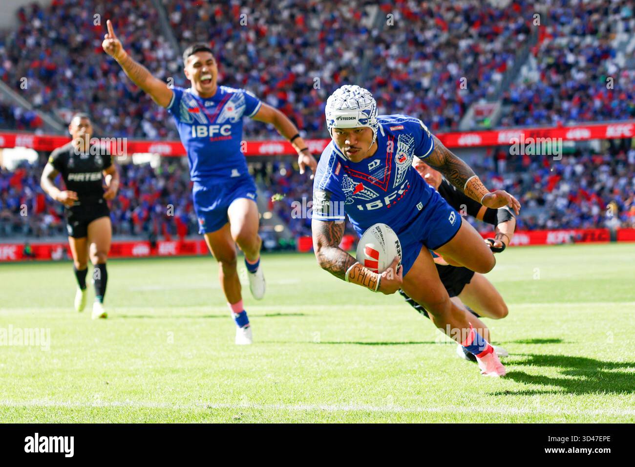 Brian To’o of Toa Samoa scores a try during the rugby league Pacific ...