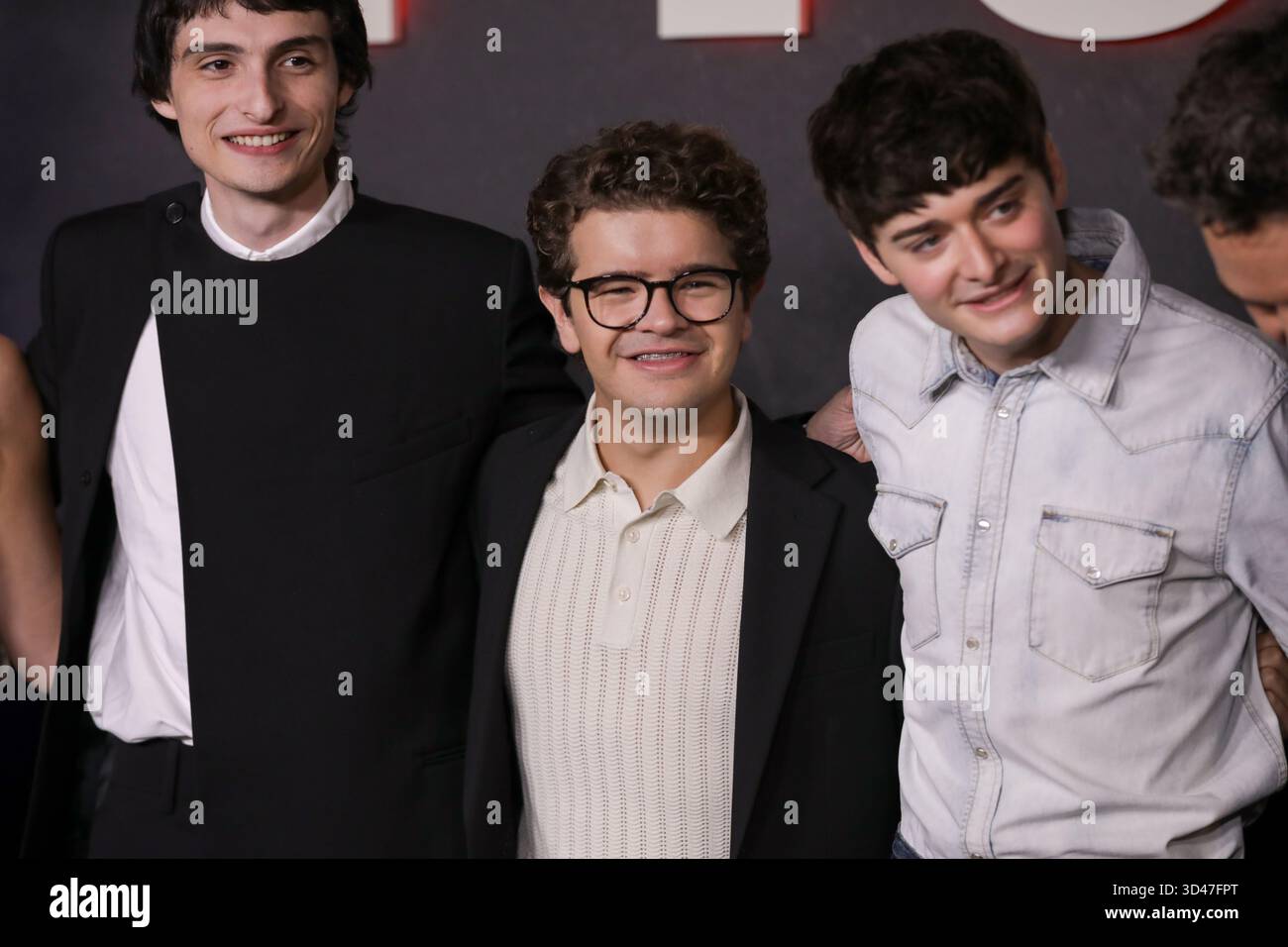 Finn Wolfhard, from left, Gaten Matarazzo, and Noah Schnapp arrive at ...