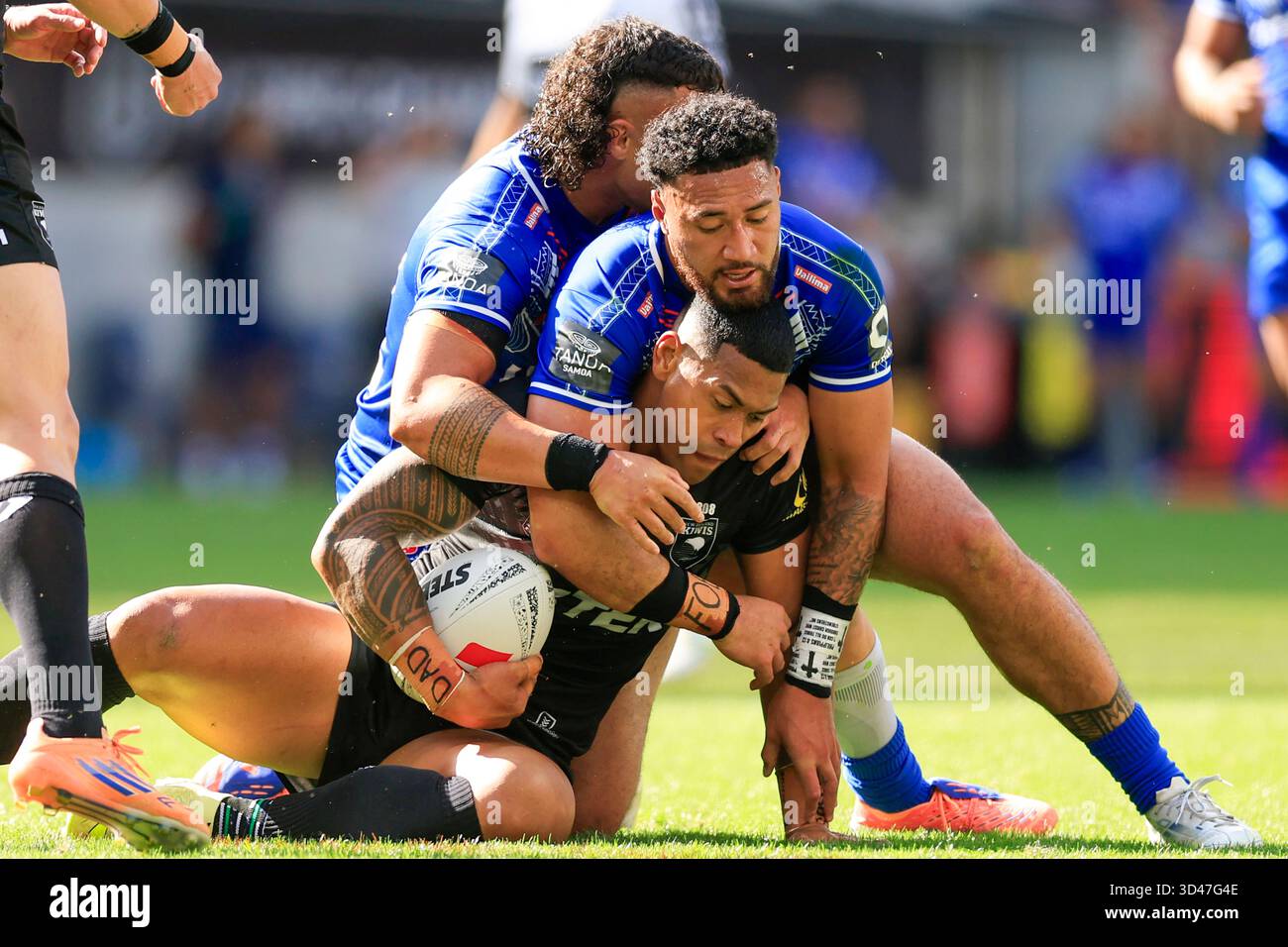 Jamayne Isaako of the Kiwis is tackled during the rugby league Pacific ...