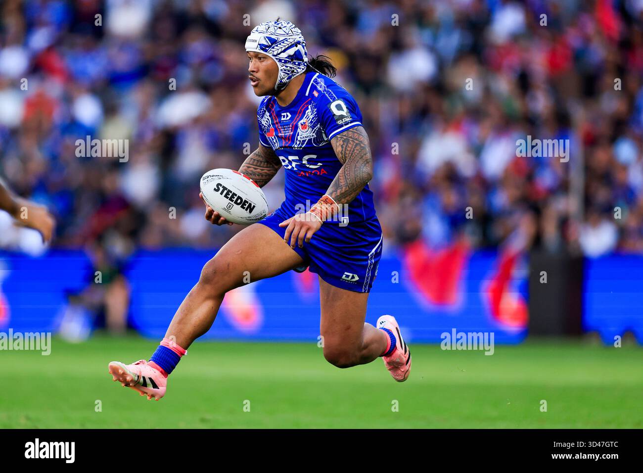 Brian To’o of Toa Samoa runs with the ball during the rugby league ...