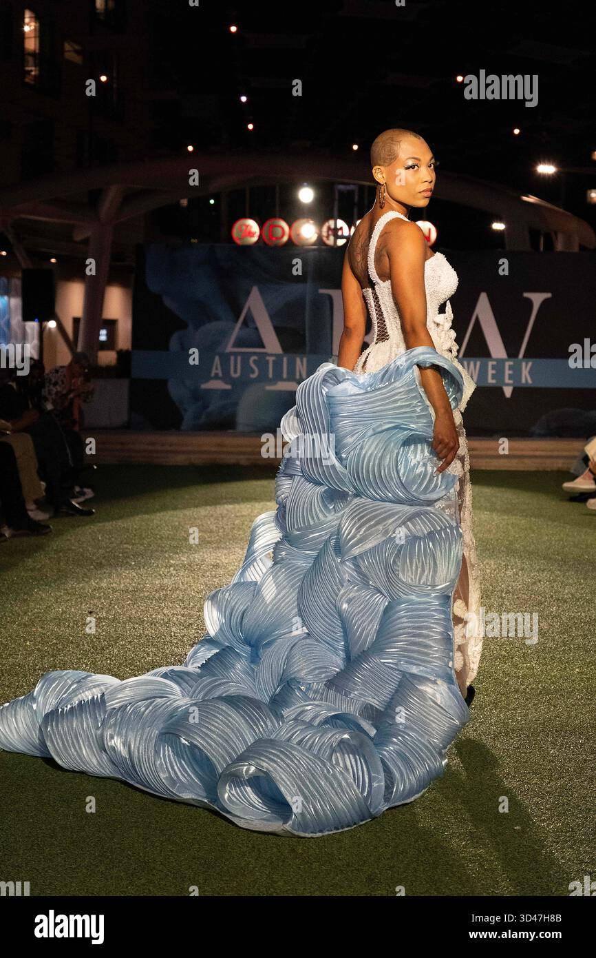 November 8, 2025: Austin Fashion Week models in action during nighttime ...