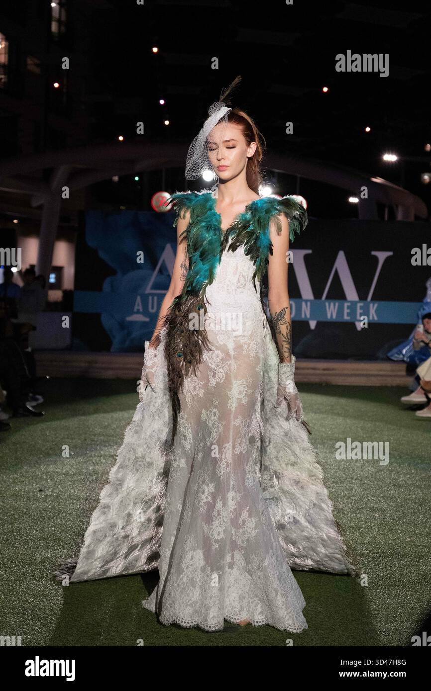 November 8, 2025: Austin Fashion Week models in action during nighttime ...
