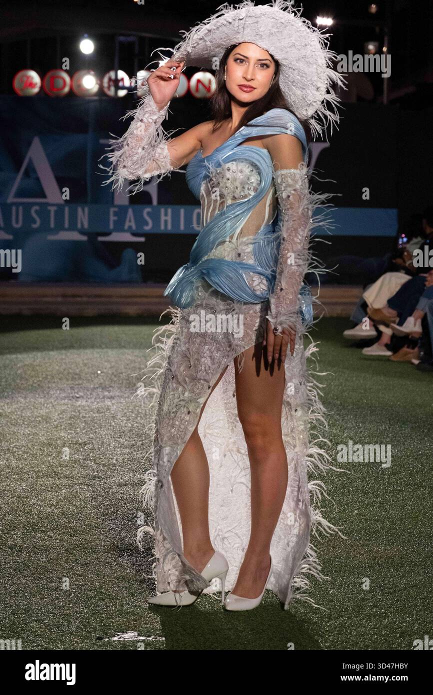 November 8, 2025: Austin Fashion Week models in action during nighttime ...