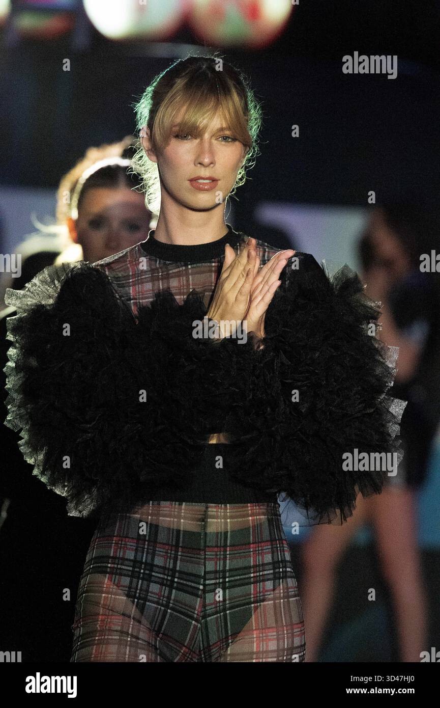 November 8, 2025: Austin Fashion Week models in action during nighttime ...