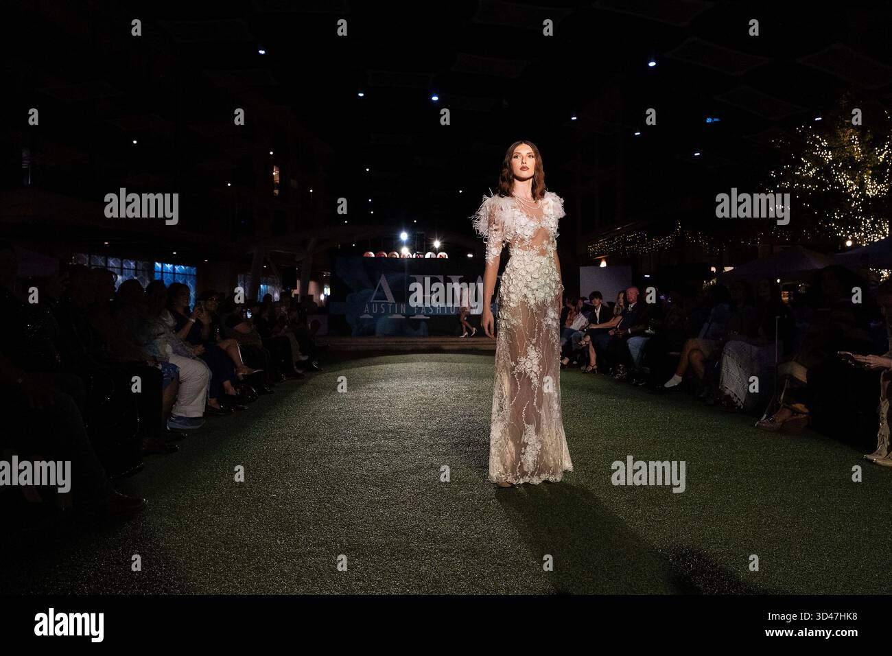 November 8, 2025: Austin Fashion Week models in action during nighttime ...