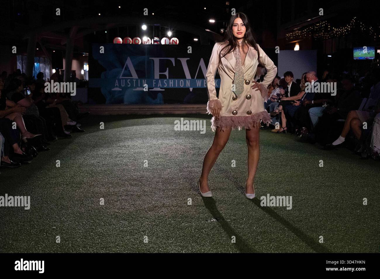 November 8, 2025: Austin Fashion Week models in action during nighttime ...