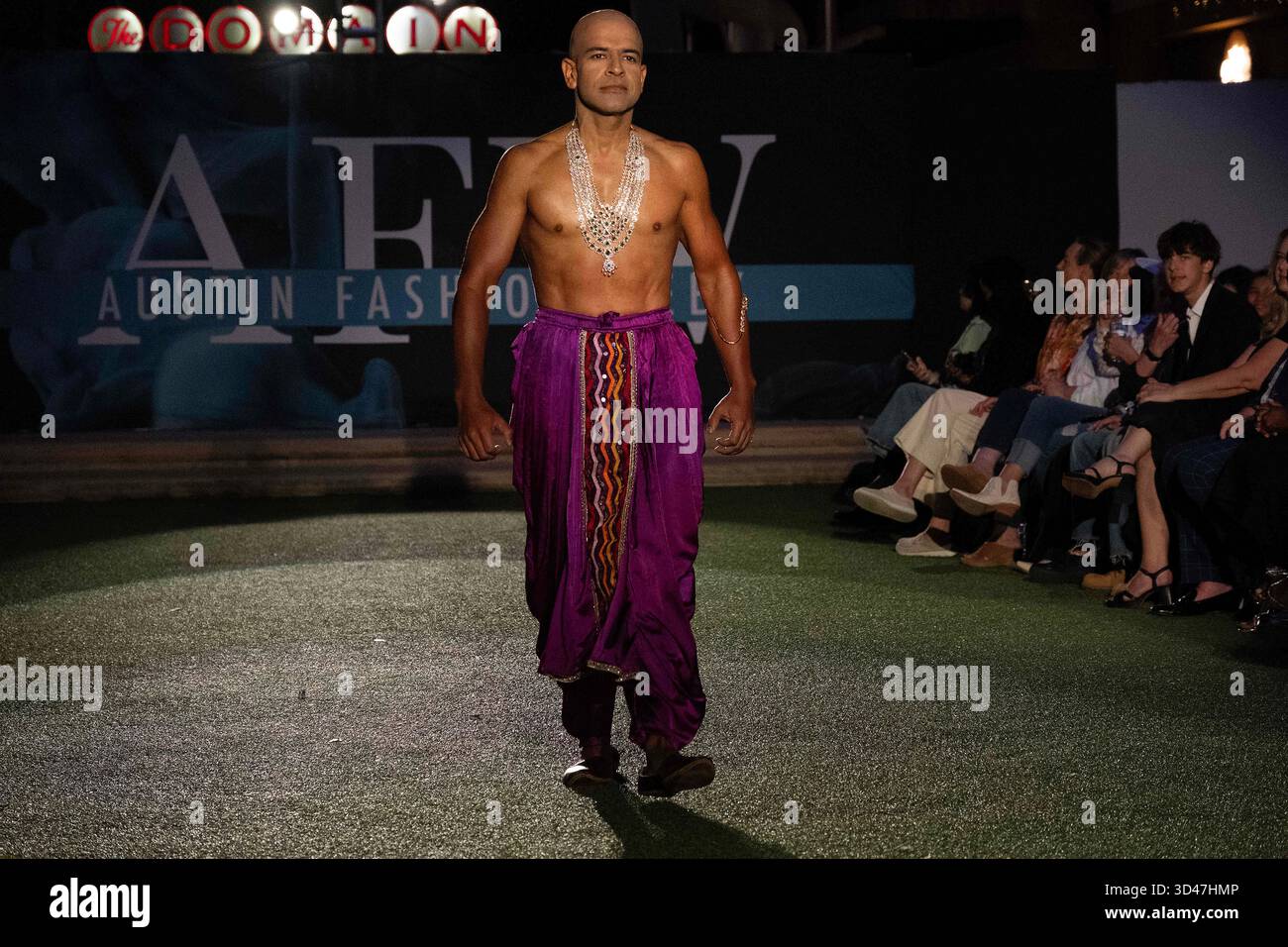November 8, 2025: Austin Fashion Week models in action during nighttime ...