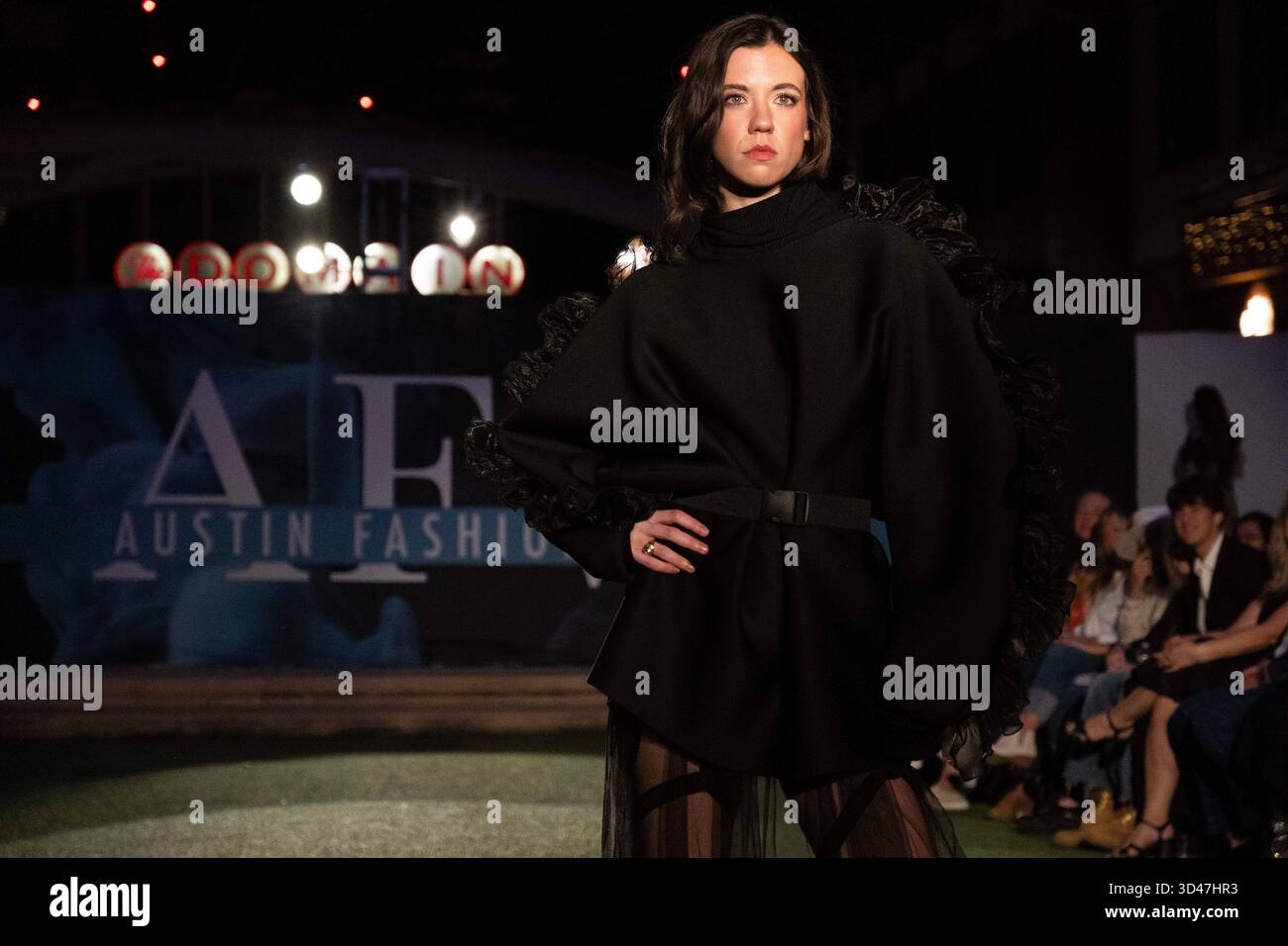 November 8, 2025: Austin Fashion Week models in action during nighttime ...