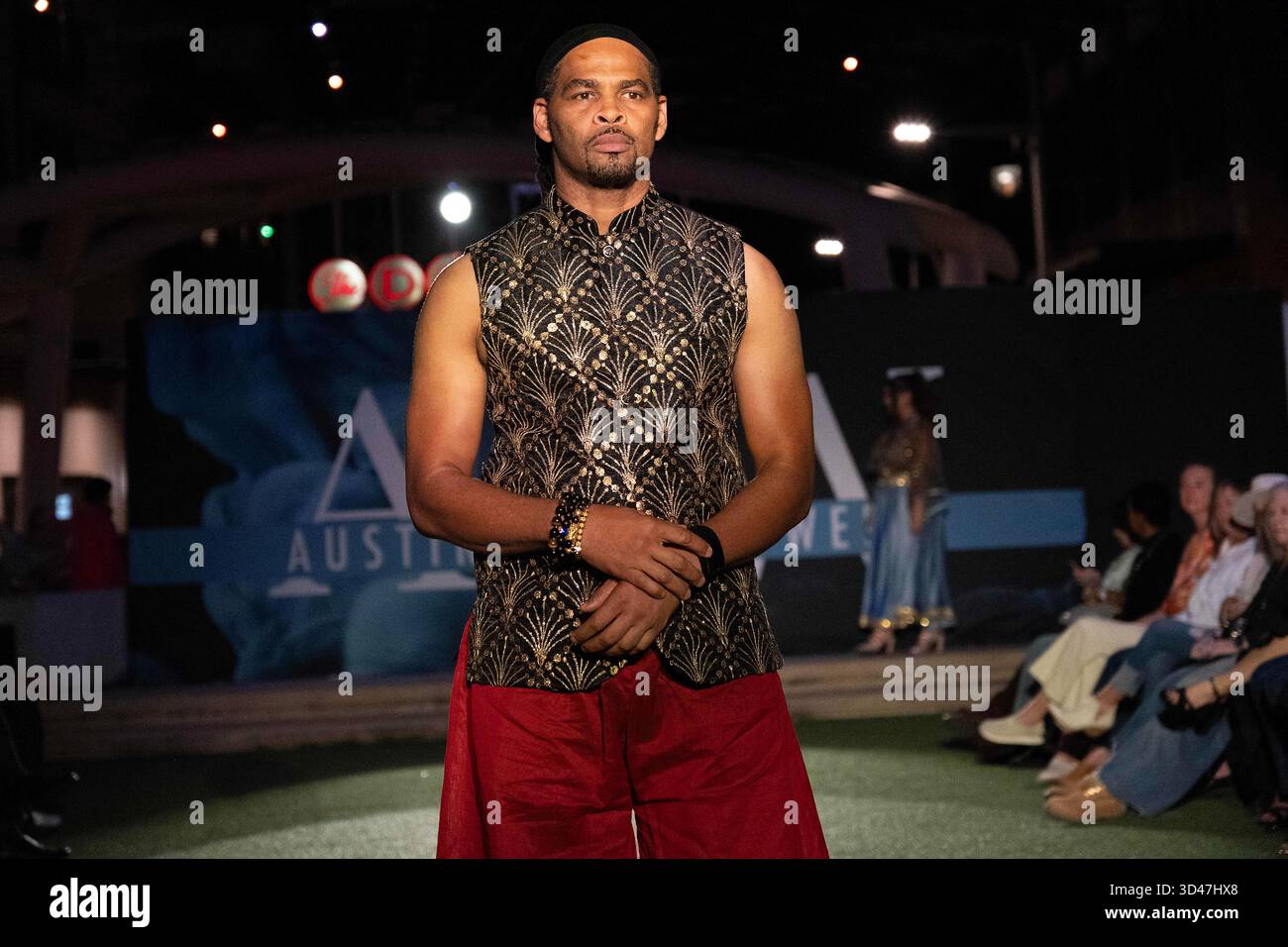 November 8, 2025: Austin Fashion Week models in action during nighttime ...
