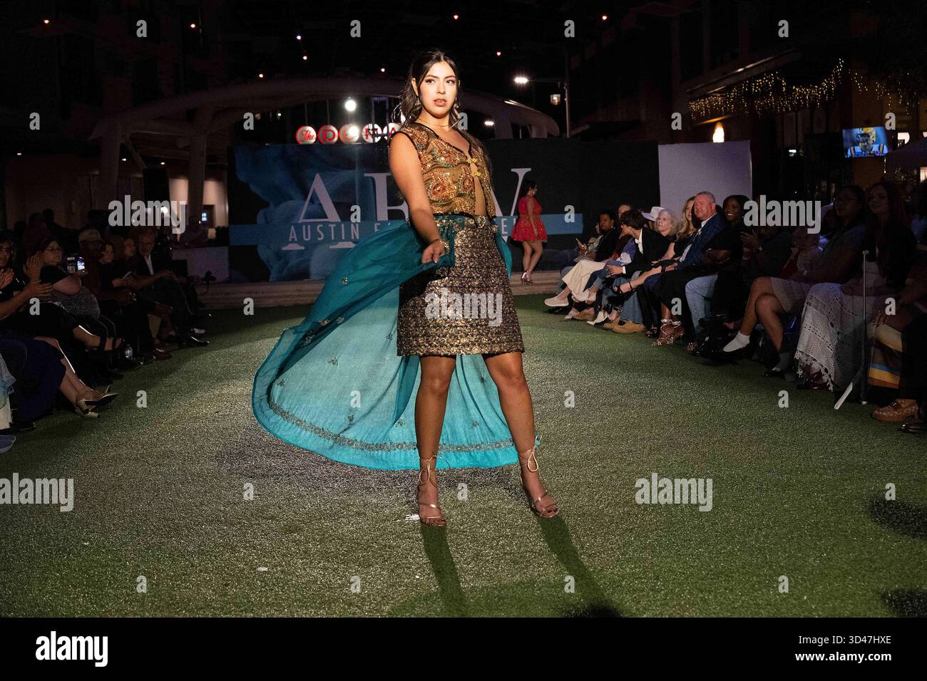 November 8, 2025: Austin Fashion Week models in action during nighttime ...