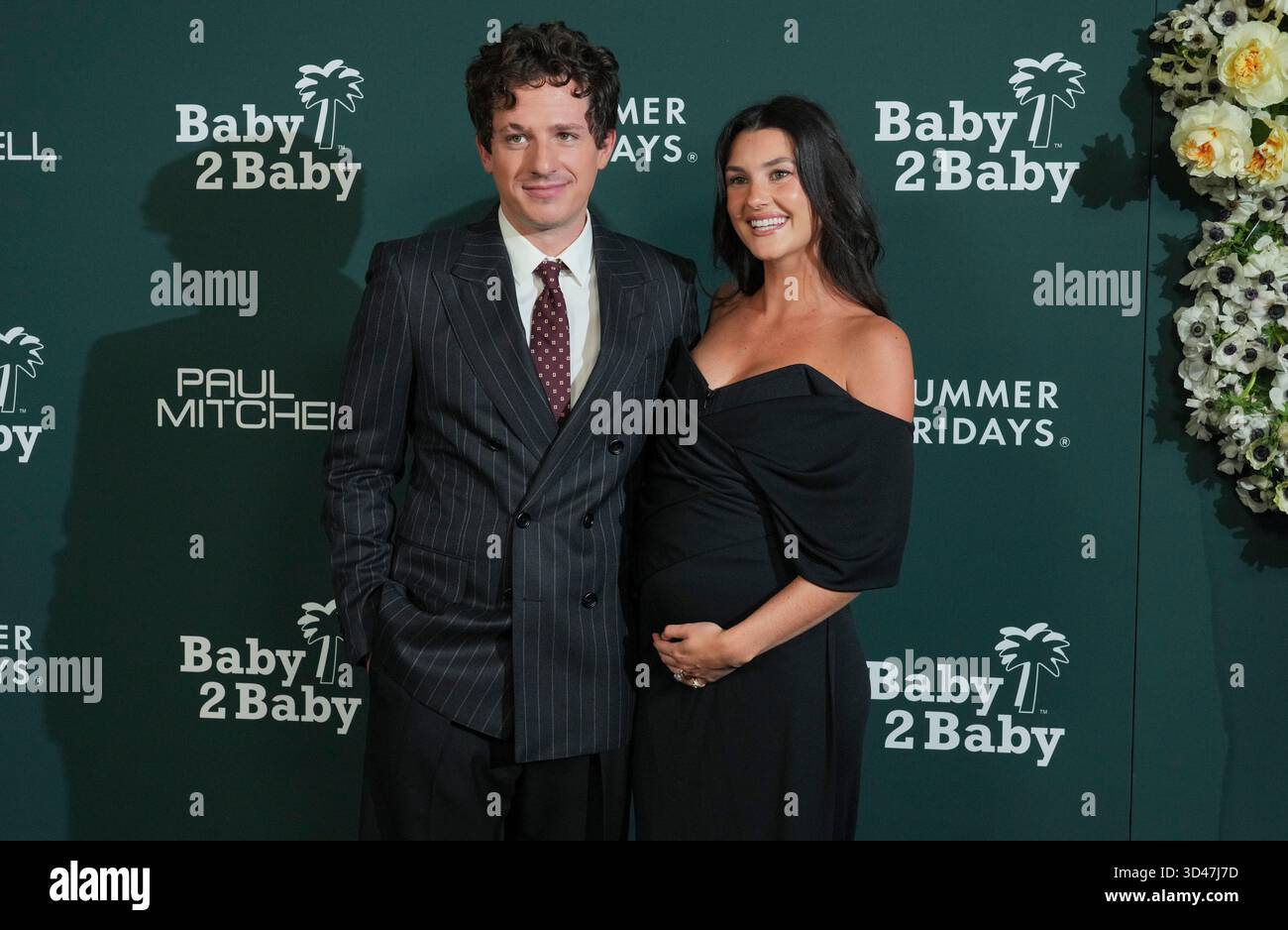 Charlie Puth, left, and Brooke Sansone arrive at the 2025 Baby2Baby ...