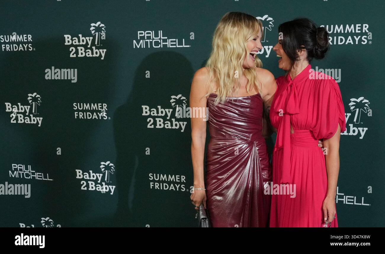 Malin Akerman, left, and Katie Lowes arrive at the 2025 Baby2Baby gala ...