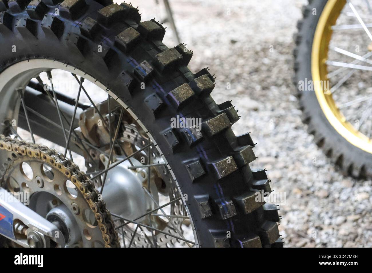 Powerful off road motorcycle tire with rugged black rubber tread, this ...