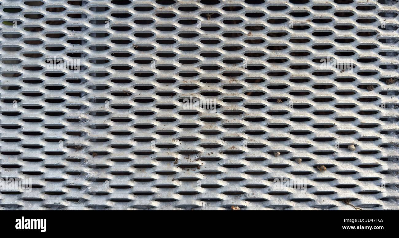 Metal grid texture with oval holes and industrial pattern Stock Photo ...