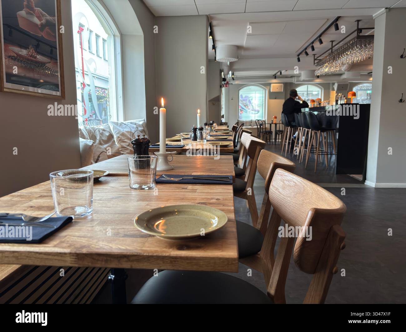 Stylish cafe interior in Helsingborg city centre featuring tables and ...