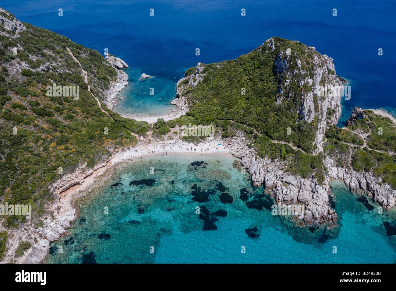 Aerial view of Porto Timoni and Limni beach - famous double beach near ...