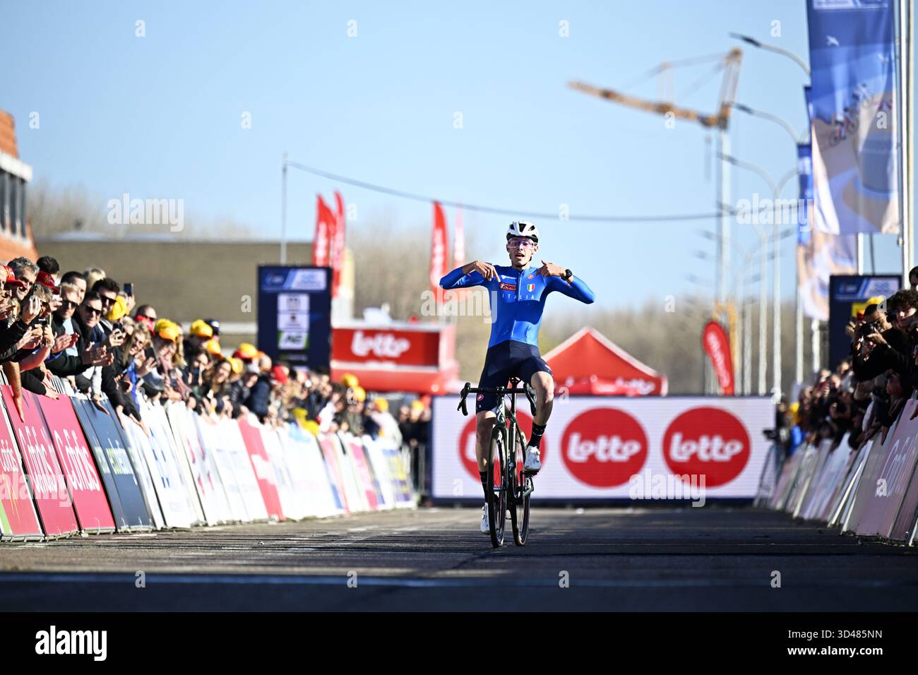 Italian Filippo Grigolini celebrates as he crosses the finish line to ...