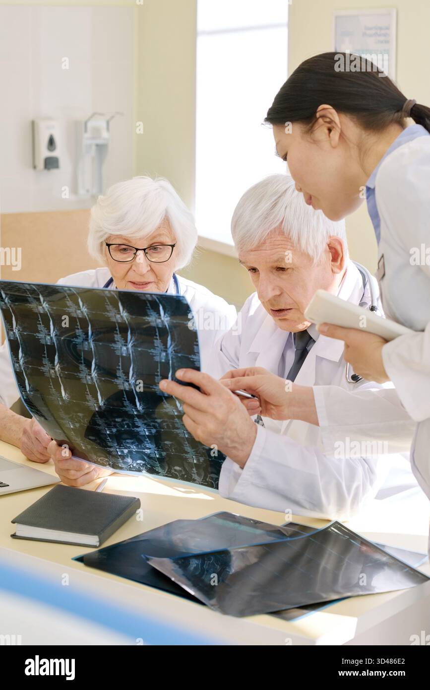 Group elderly experienced doctors hi-res stock photography and images ...