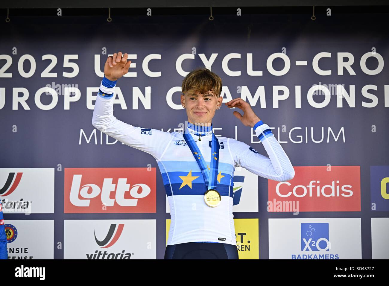 Italian Filippo Grigolini celebrates on the podium after winning the ...