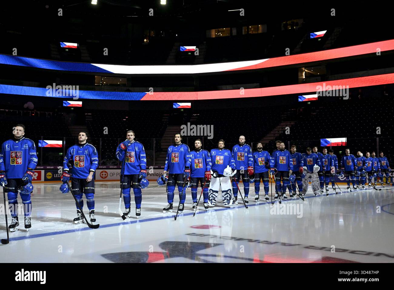 Czech players stand on ice during the national anthems during the Euro Hockey Tour EHT ice ...